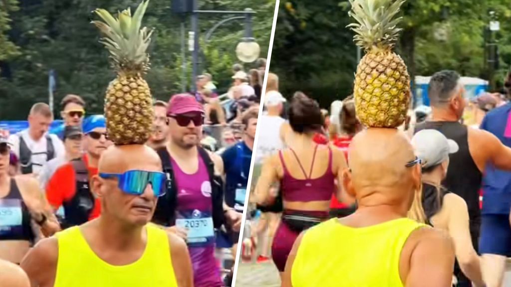 Huh? Man rent marathon met een ananas op zijn hoofd